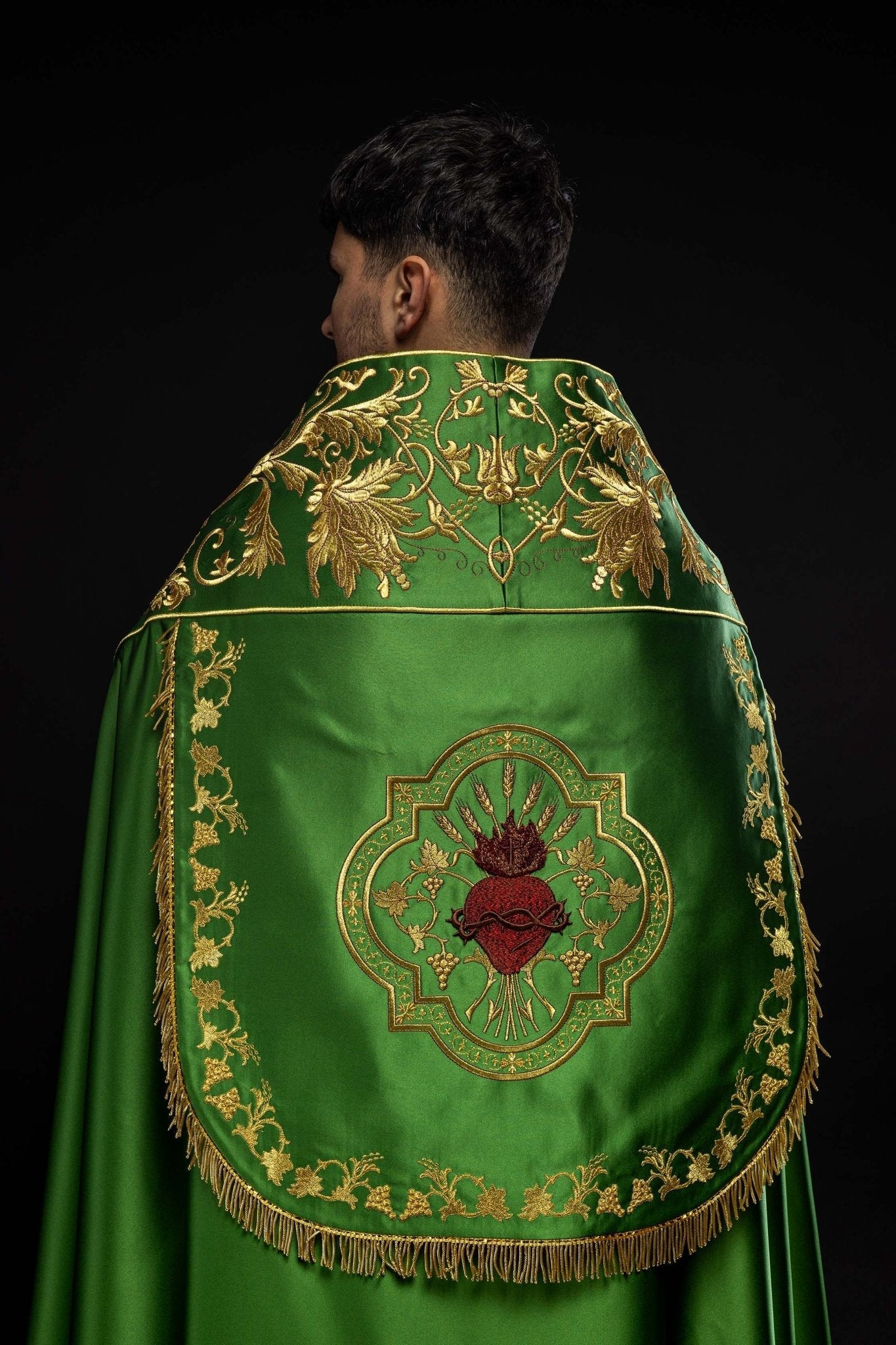Green satin Roman cape with embroidered heart of Jesus